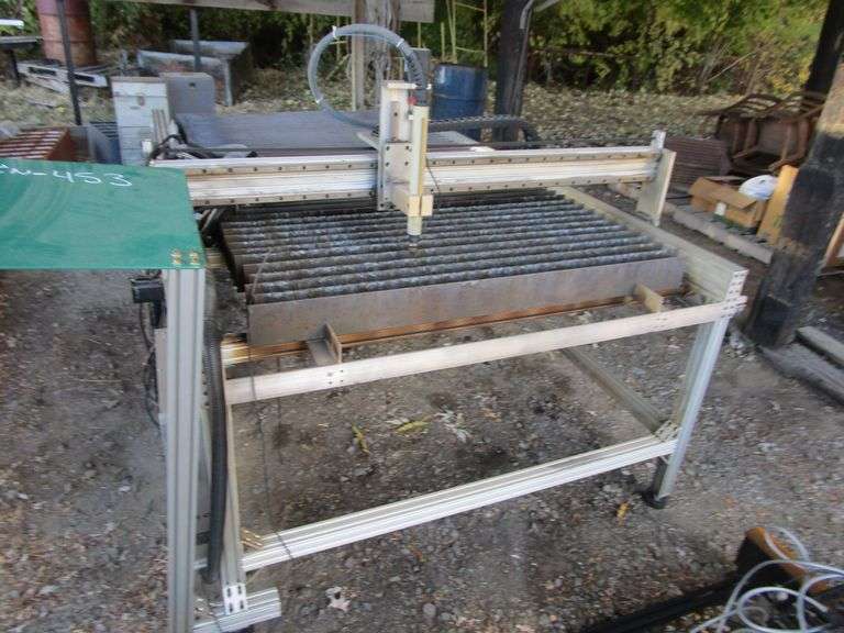 METAL 4X10 TORCH CUT OUT TABLE - Heaverlo Northwest Auctions