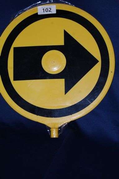 ROUND YELLOW AND BLACK SIGN WITH ARROW TWO SIDED - Dallas Online ...