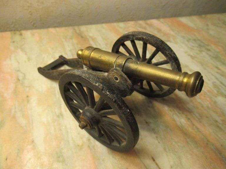 VINTAGE MINI CANNONS IN CAST AND BRASS - Dallas Online Auction Company