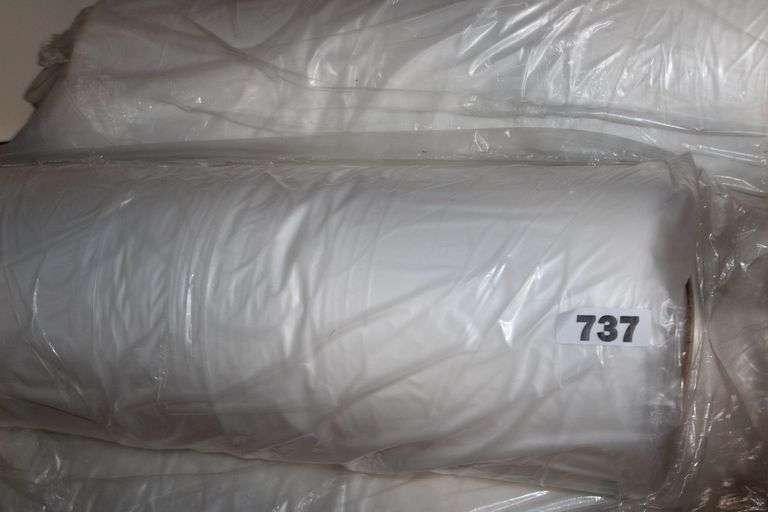 LARGE PLASTIC ROLL OF CLEAR PLASTIC - Dallas Online Auction Company