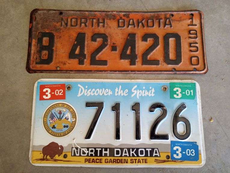 2 North Dakota license plates - Integrity Auctioneers