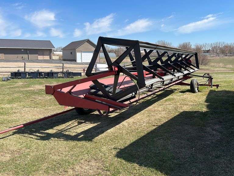 IH 75 Swather - Integrity Auctioneers