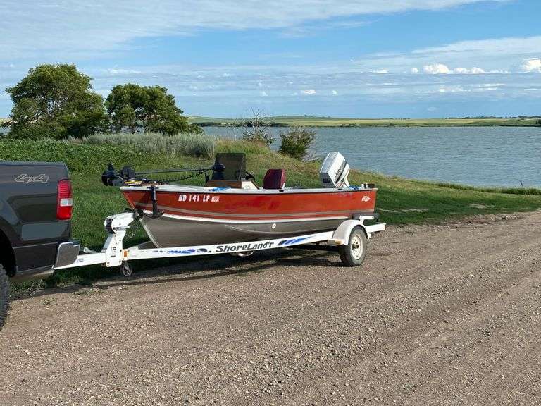 Lund Mr. Pike Fishing Boat with Motor & Trailer - Integrity Auctioneers