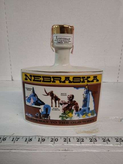 ANNIVERSARY NEBRASKA DECANTER HAS CONTENTS - Isabell Auction