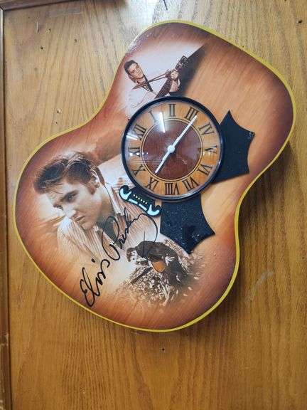 ELVIS GUITAR CLOCK - Isabell Auction