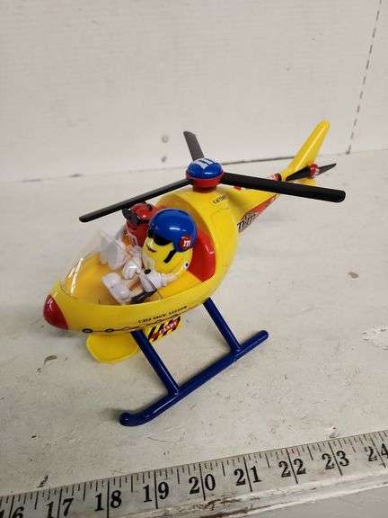 M&M BATTERY OPERATED HELICOPTER CANDY DISPENSER - Isabell Auction