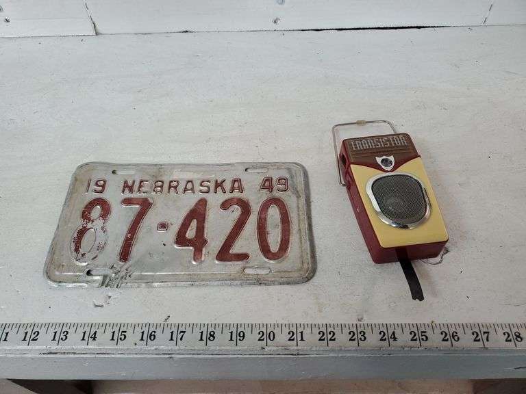 VINTAGE HANDHELD RADIO & NEBRASKA LICENSE PLATE - Isabell Auction
