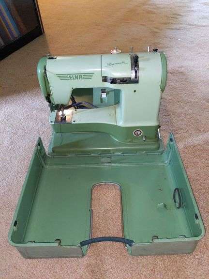 VINTAGE ELNA SUPERMATIC SEWING MACHINE IN FOLD-UP CASE - Isabell Auction