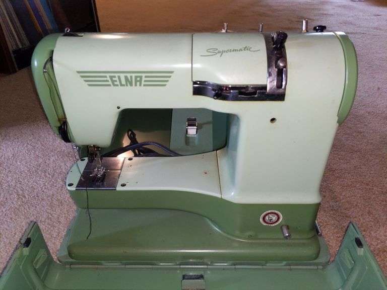 VINTAGE ELNA SUPERMATIC SEWING MACHINE IN FOLD-UP CASE - Isabell Auction