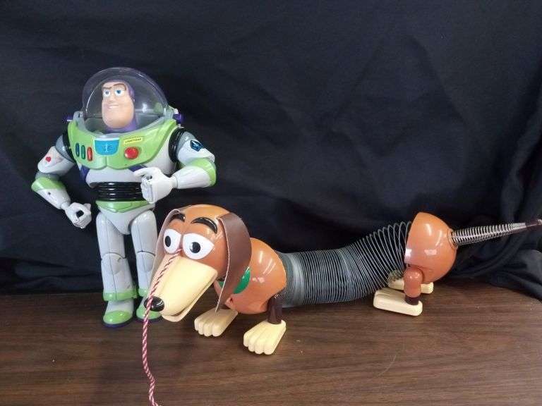 (12-INT) BUZZ LIGHTYEAR ACTION FIGURE AND SLINKY DOG - Isabell Auction