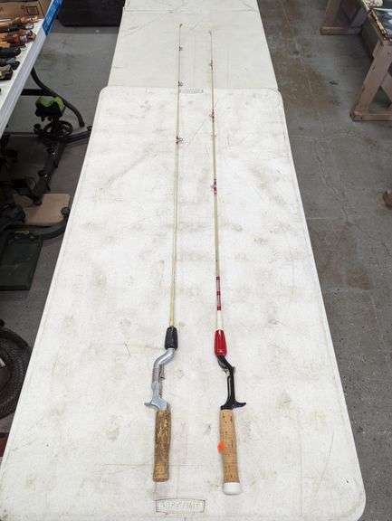 (2) FISHING RODS ((1) IS STEEL) - Isabell Auction