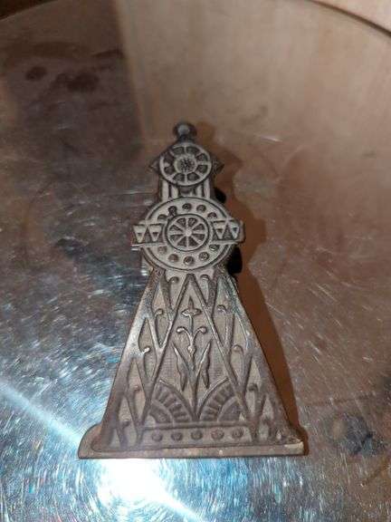 ANTIQUE EASTLAKE STYLE CAST IRON WALL MOUNT PAPER CLIP - Isabell Auction