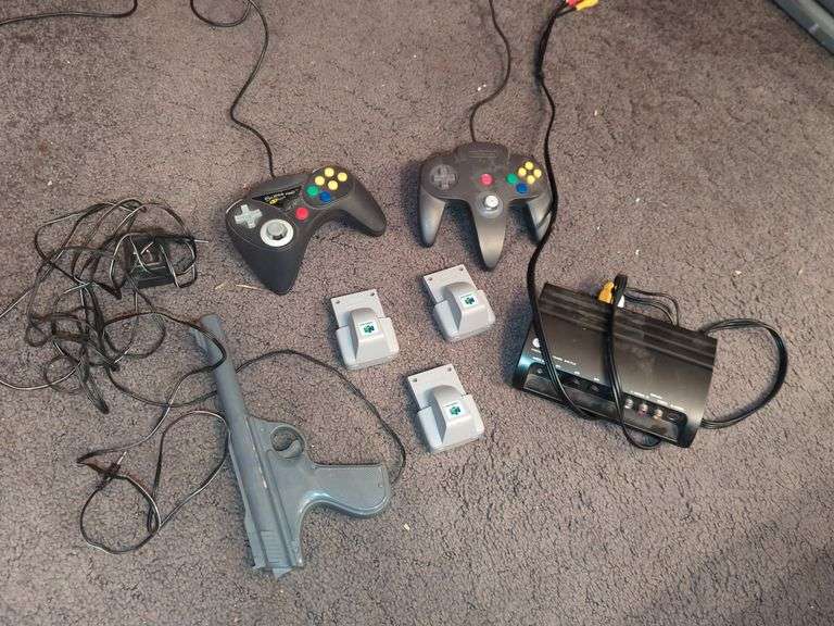 NINTENDO 64 CONTROLLERS, RUMBLE PACKS, GAME SWITCH, GUN CONTROLLER, ETC ...