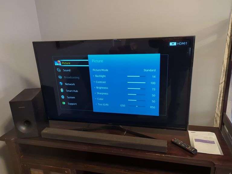 SAMSUNG 48" FLAT SCREEN SMART TV WITH REMOTE, SOUND BAR, & SUB (STAND ...