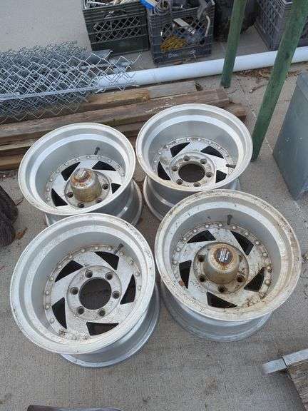 SET OF (4) AMERICAN RACING 15" ALUMINUM WHEELS - Isabell Auction