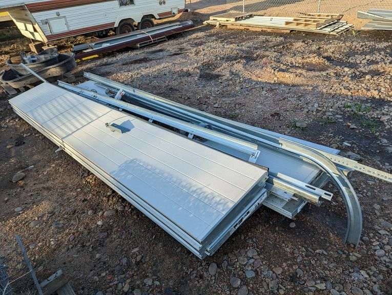 14 FT X 14 FT GARAGE DOOR WITH TRACK Isabell Auction