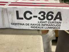 Pair of Liftmaster Garage Door Light Curtains - Jardine Auctioneers