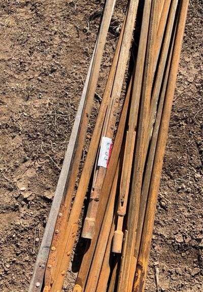 Qty 12 Wood Sucker Rods - J&J Auctioneers LLC