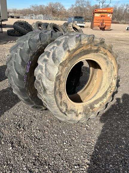 Qty 2 Firestone 19.5x24 Rear Backhoe Tires - J&J Auctioneers LLC