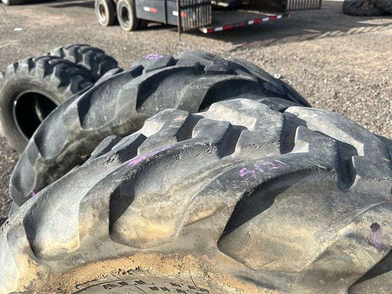 Qty 2 Firestone 19.5x24 Rear Backhoe Tires - J&J Auctioneers LLC