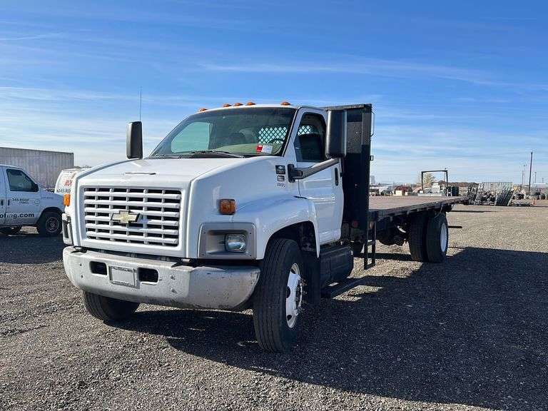 2006 Chevy C-7500 Flatbed Truck - J&J Auctioneers LLC