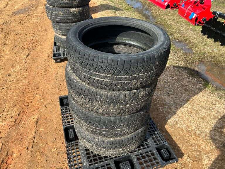(4) Bridgestone Dueler H/T Tires 285/45 R22 - JJ Merchant