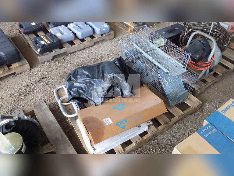 PALLET OF MISC. WALKERS & TRAPS - Jeff Martin Auctioneers, Inc.