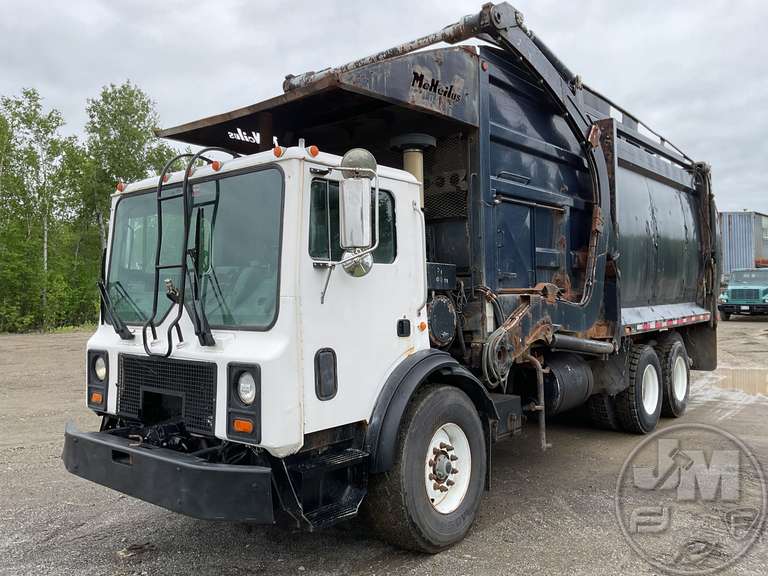 MACK T/A FRONT LOAD COLLECTION TRUCK - Jeff Martin Auctioneers, Inc.