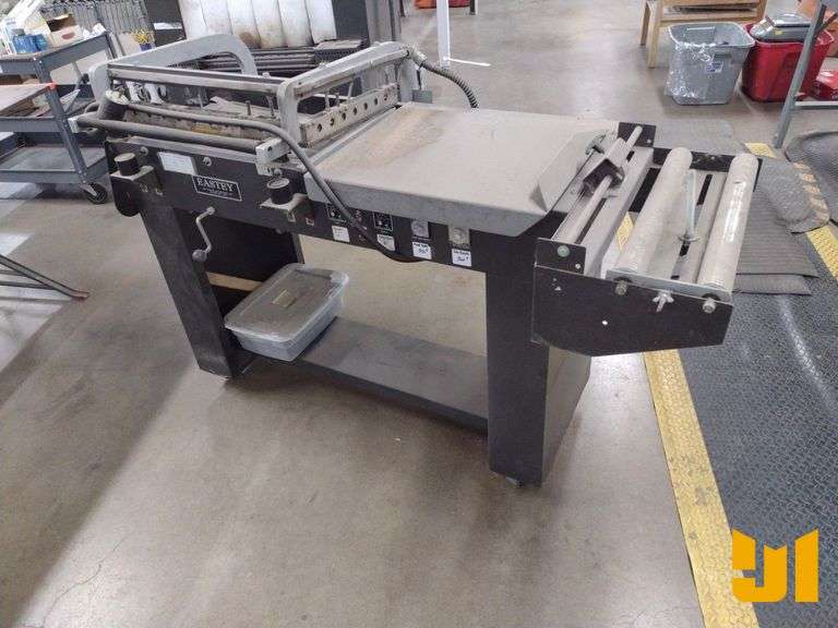 EASTEY SHRINK WRAPPER - Jeff Martin Auctioneers, Inc.