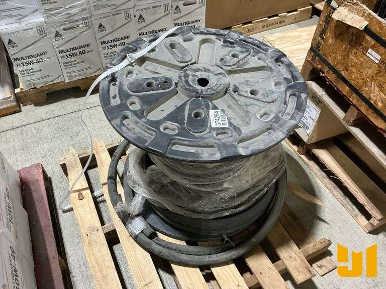 SPOOL OF RUBBER HOSE - Jeff Martin Auctioneers, Inc.