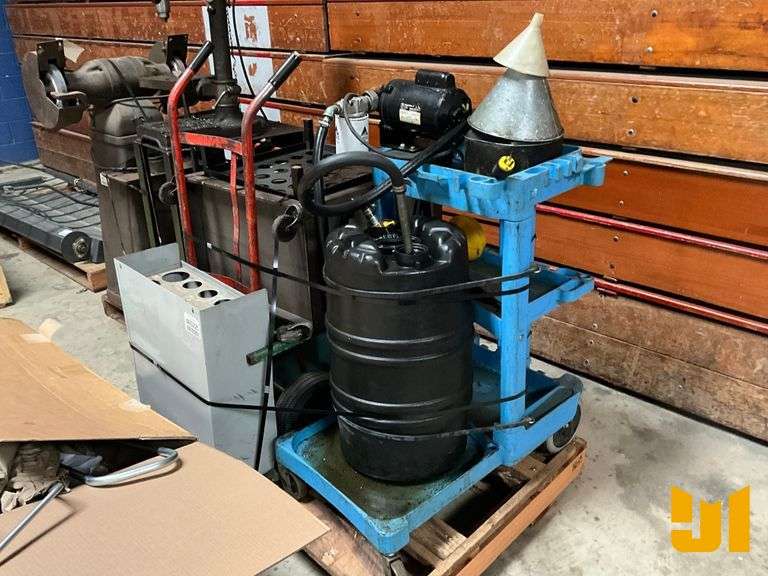 OIL BARREL, PUMP, STANDS & DOLLY CART - Jeff Martin Auctioneers, Inc.