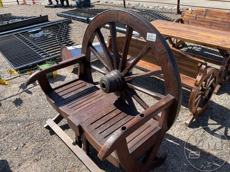 TEAK WOOD WAGON WHEEL BENCH - Jeff Martin Auctioneers, Inc.
