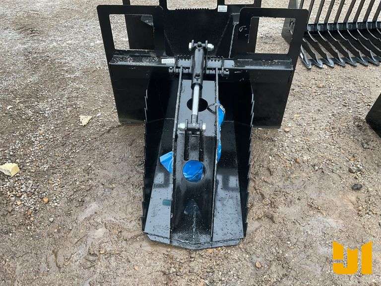 UNUSED KC SKID STEER SPADE GRAPPLE - Jeff Martin Auctioneers, Inc.