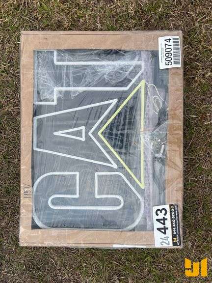 UNUSED CATERPILLAR NEON SIGN - Jeff Martin Auctioneers, Inc.
