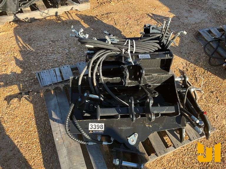 PALLET OF MINI EXCAVATOR TRACKS, HYDRAULIC BUCKET, GRAPPLE, HYDRAULIC ...