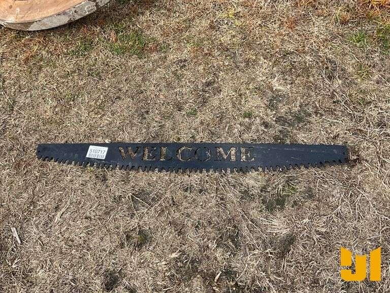 METAL SAW BLADE WELCOME SIGN - Jeff Martin Auctioneers, Inc.