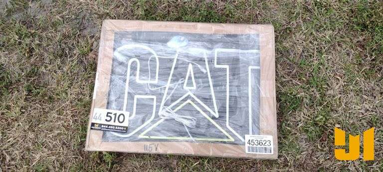 UNUSED CATERPILLAR NEON SIGN - Jeff Martin Auctioneers, Inc.