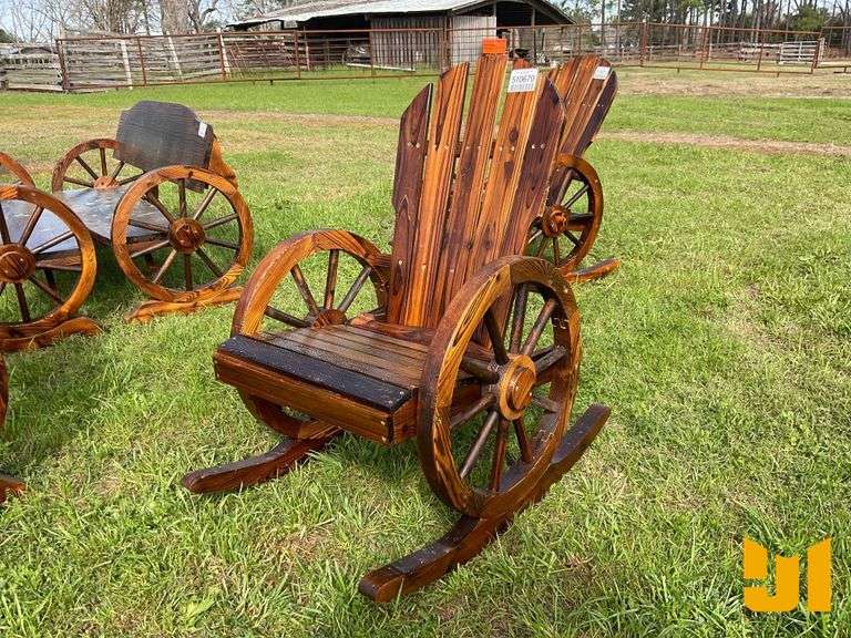 WOODEN WAGON WHEEL ROCKING CHAIR - Jeff Martin Auctioneers, Inc.