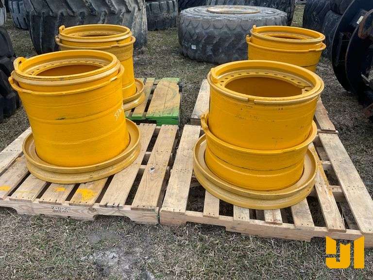 QTY (4) 20 LUG LOADER RIMS - Jeff Martin Auctioneers, Inc.