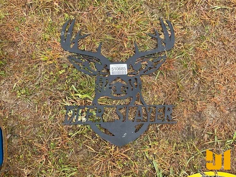 DEER SLAYER METAL SIGN - Jeff Martin Auctioneers, Inc.