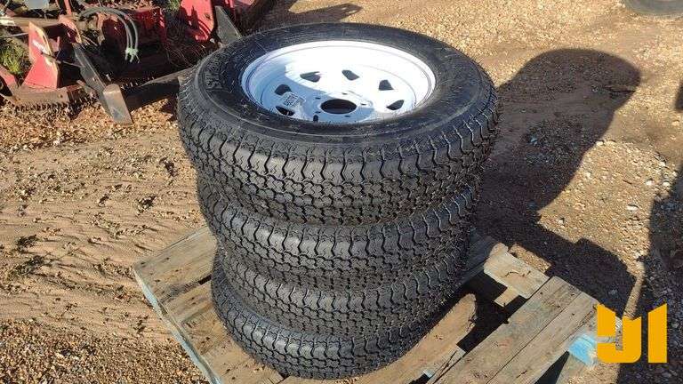 4 TRAILER TIRES - Jeff Martin Auctioneers, Inc.