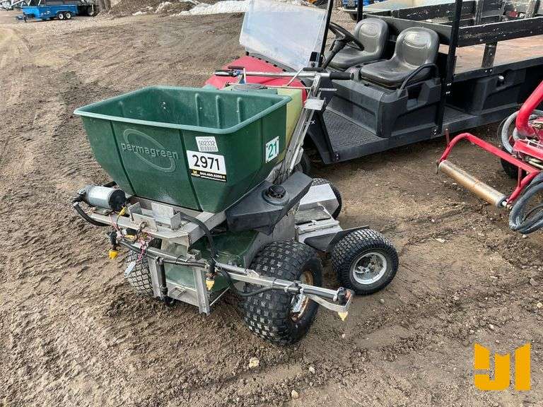 PG15 PERMAGREEN RIDE ON SPREADER - Jeff Martin Auctioneers, Inc.
