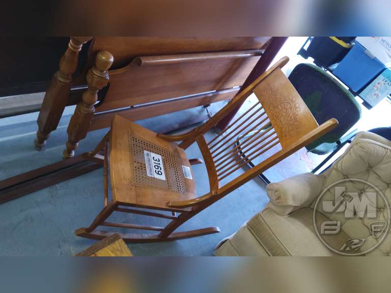 WOODEN ROCKING CHAIR WITH CANE BOTTOM - Freije & Freije Auctioneers