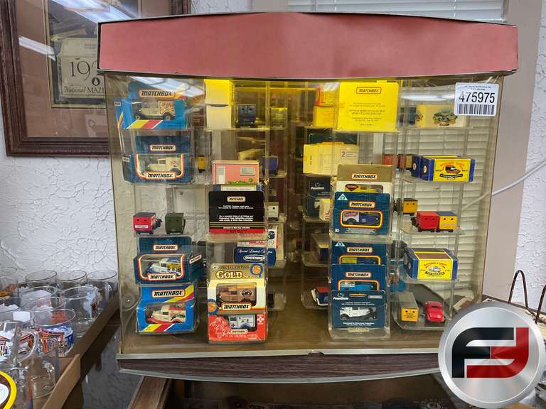 MATCHBOX MODEL A DELIVERY TRUCKS IN ELECTRIC ROTATING DISPLAY CASE ...