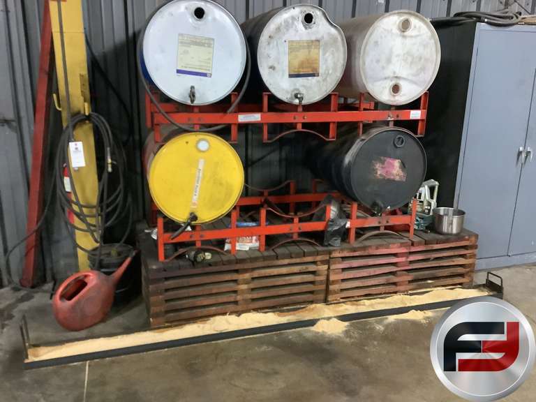 2 OIL BARREL RACKS WITH RISER AND SPILL TRAY - Freije & Freije Auctioneers