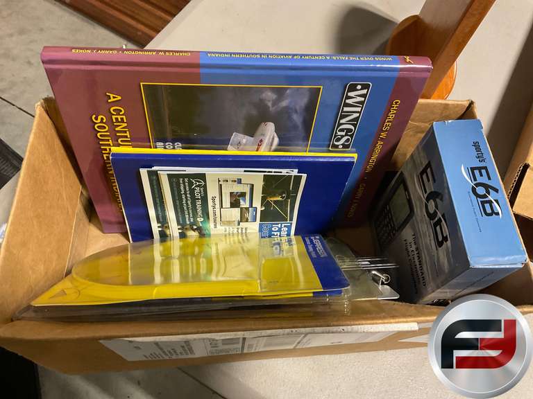FLIGHT TRAINING BOOKS, FLIGHT COMPUTERS - Freije & Freije Auctioneers