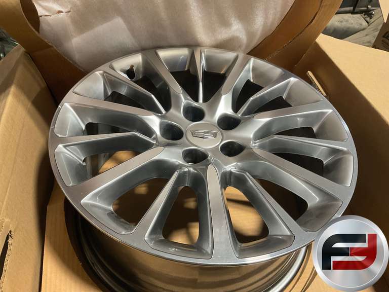 CADILLAC FACTORY TAKE OFF WHEELS - Freije & Freije Auctioneers
