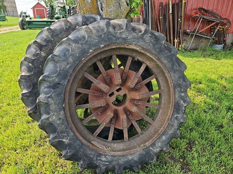 38" Flate Spoke Rims converted to rubber for Farmall M - Kramer Auction LLC