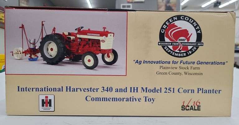 International 340 Toy Tractor w/Corn Planter - Kramer Auction LLC