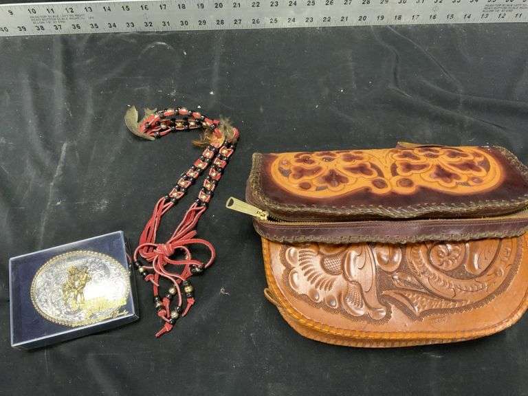 Leather tooled purses, belt buckle, etc - Legacy Auction Company